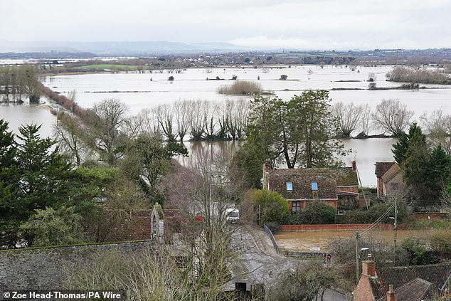 Flood-hit residents are evacuated in south west ahead of fresh ...