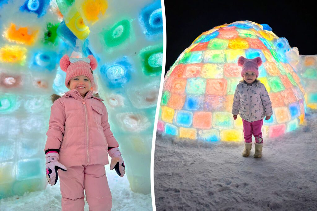 Family build rainbow igloo using snow from Storm Fern