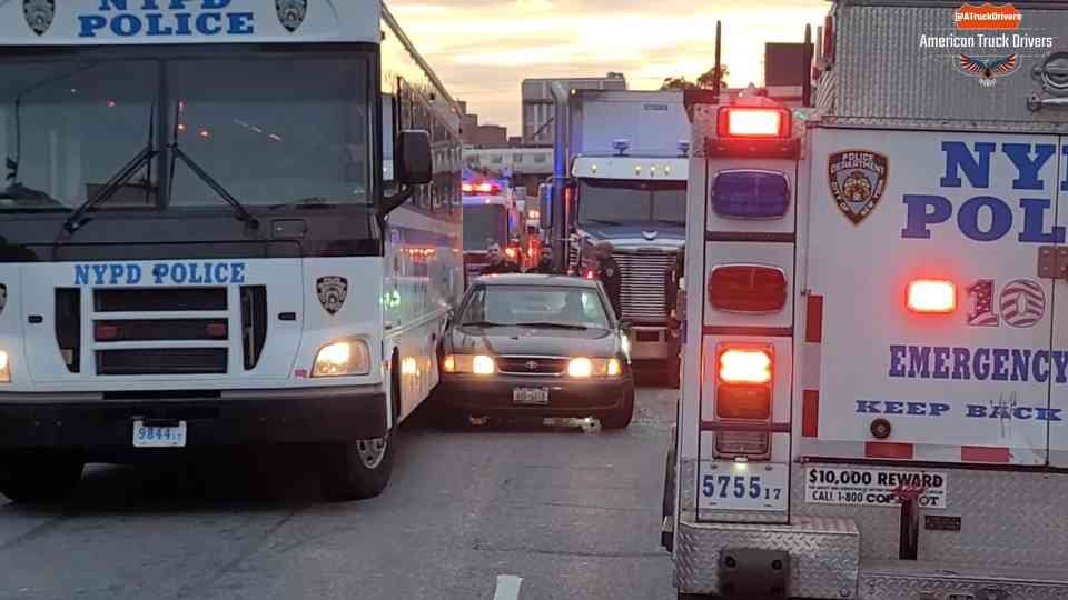 Car gets crushed between a bus and a truck during a pass