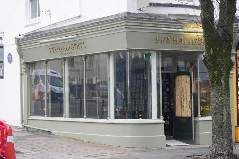 Police investigate burglary at East Sussex perfume shop - In pictures