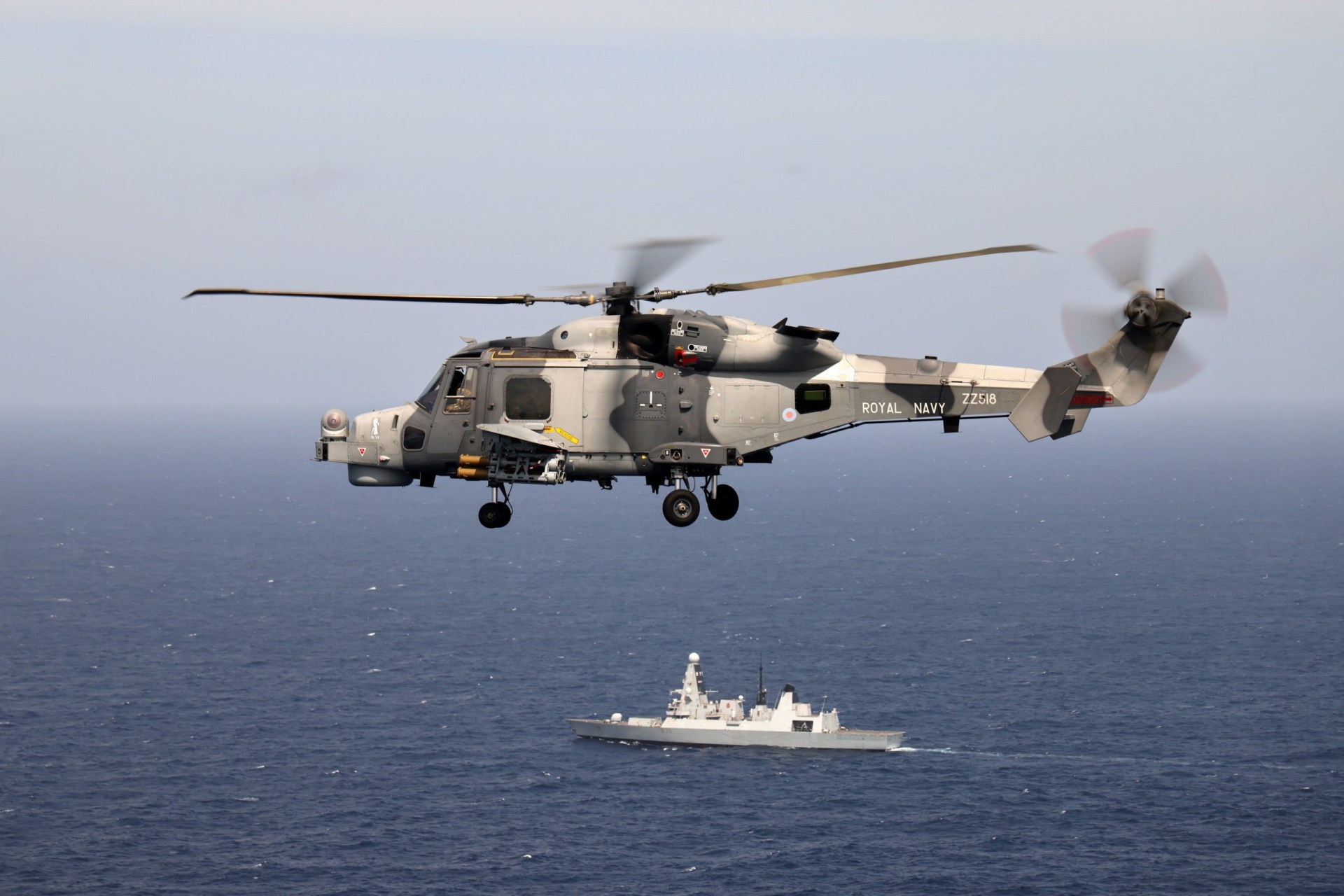 Royal Navy attack helicopter chases Russian ship out of waters close to ...