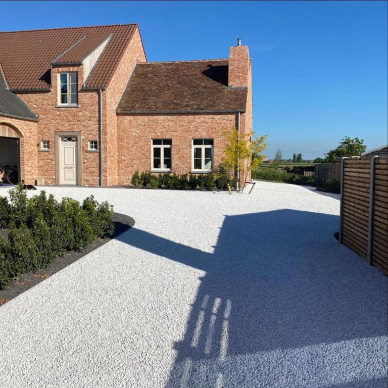 12 gravel driveway ideas to enhance your English-country curb appeal