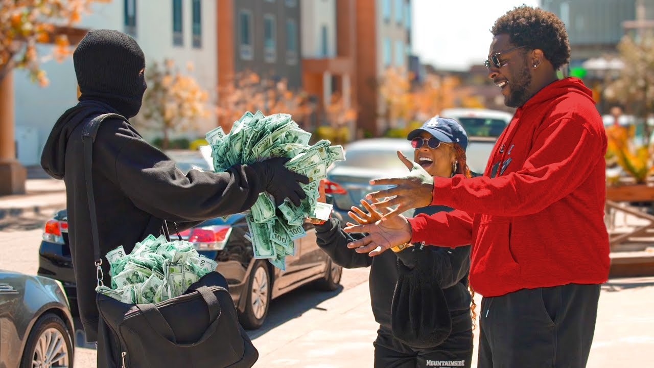 Dropping a stack of real cash in public