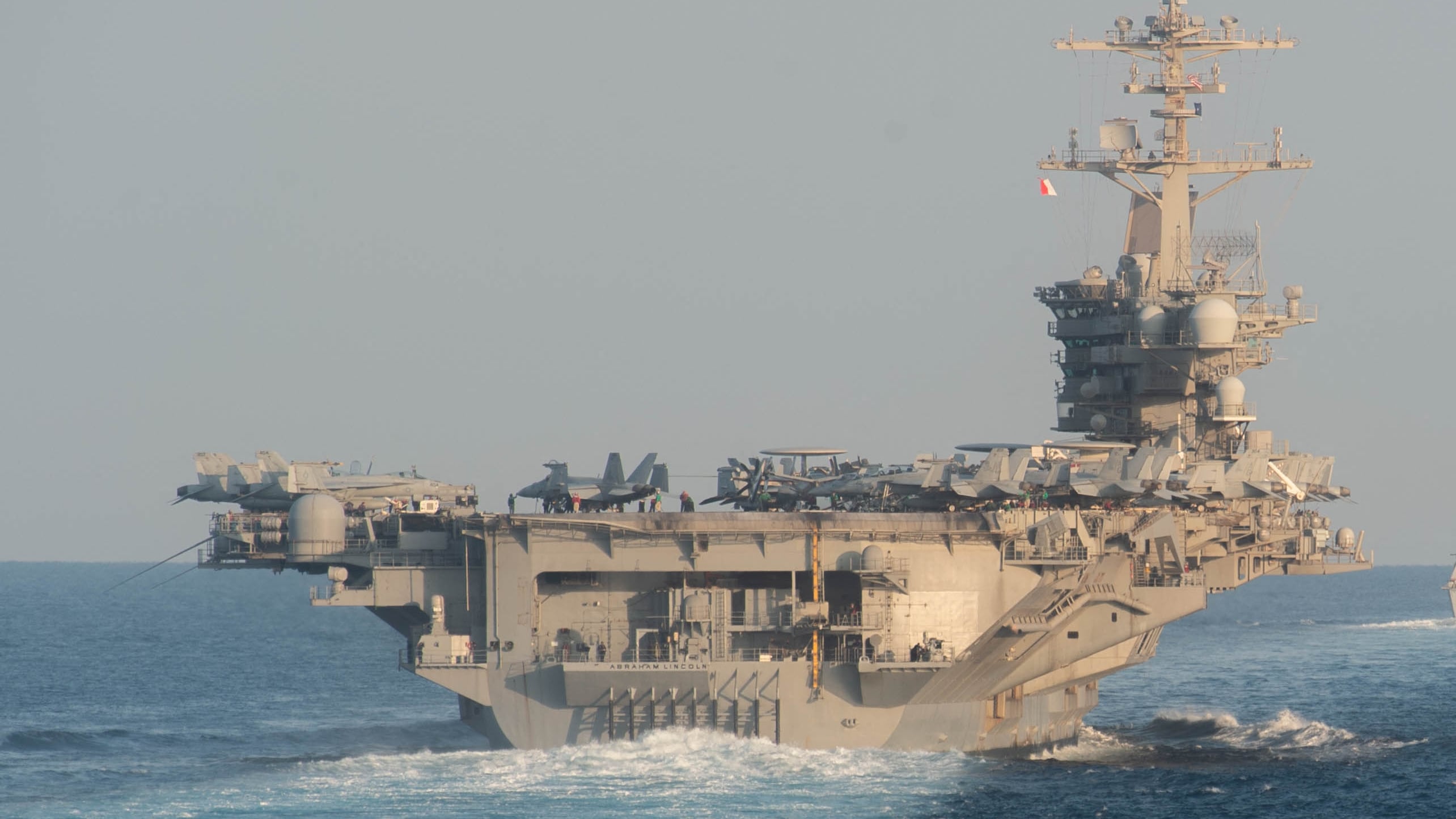 Trump pressures Iran on nuclear deal with carrier deployment