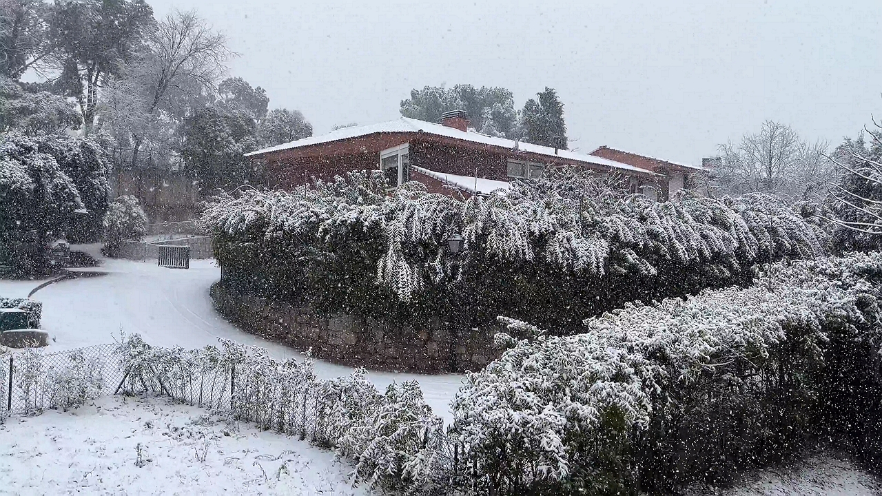 Snow blankets La Moraleja during winter storm in Madrid, Spain