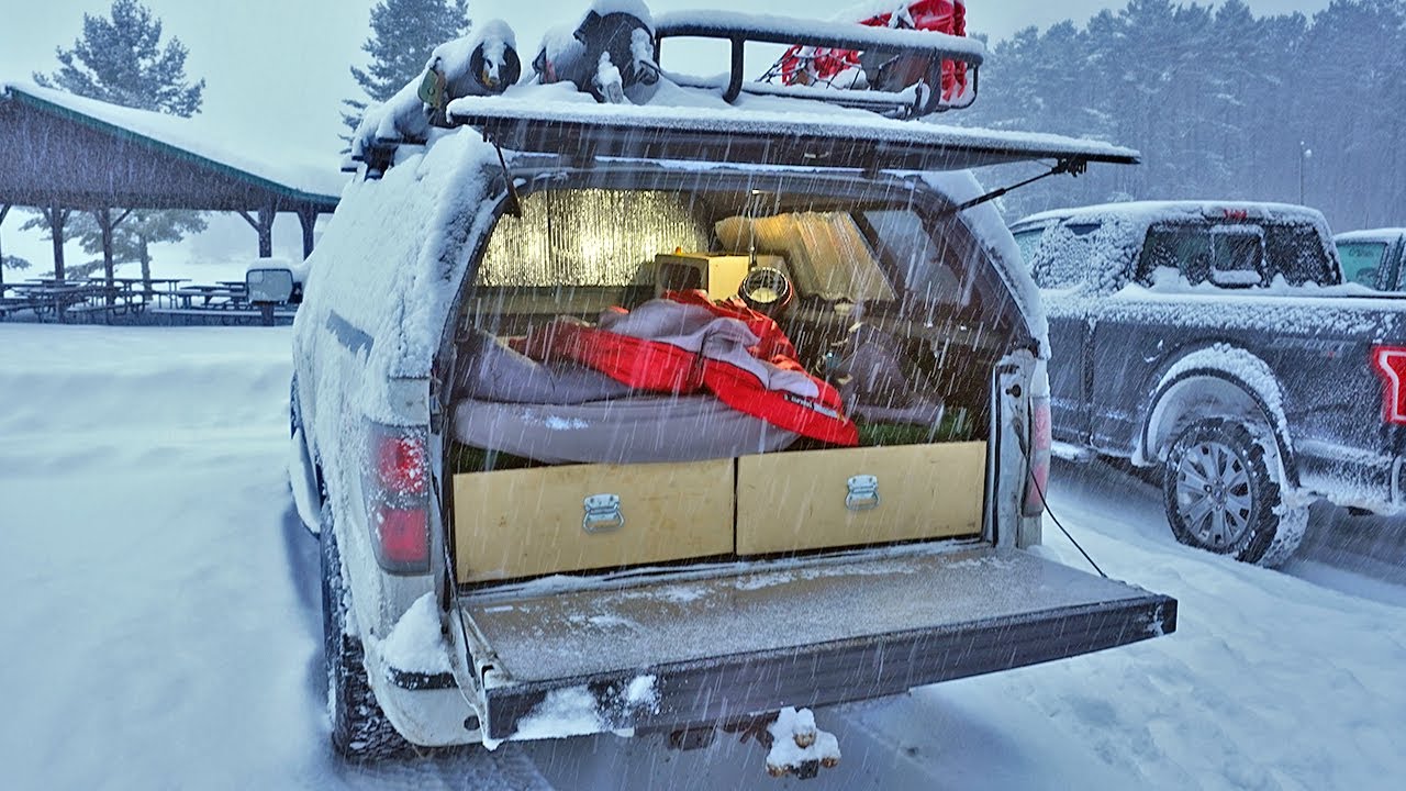 Solo overnight truck camping in a blizzard