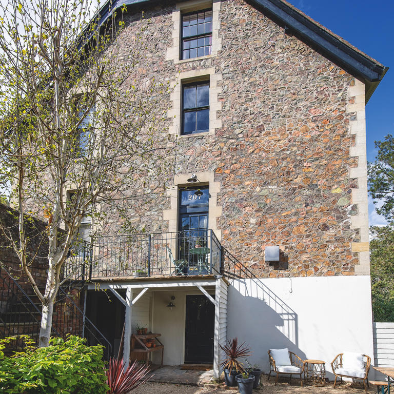 This converted clothes shop and cafe is now a cool family home