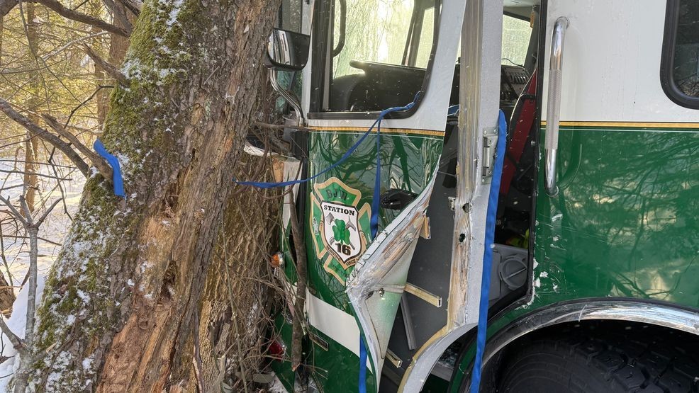 Photos | Firefighters hurt after tanker crashes into tree on icy ...