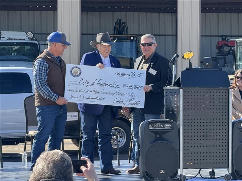 Congressman Carter presents $775,000 check for Gatesville water tower ...