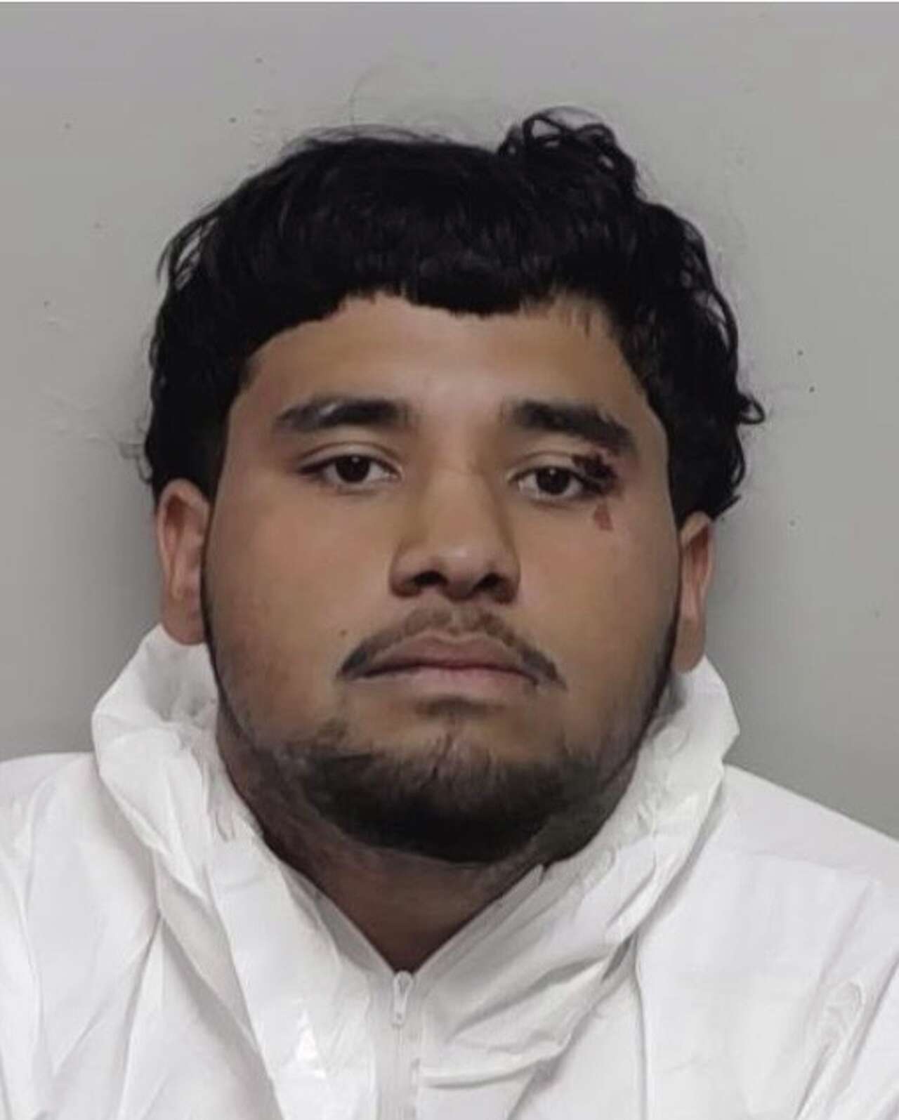 Suspect arrested on murder charge in deadly shooting over debt on East Side