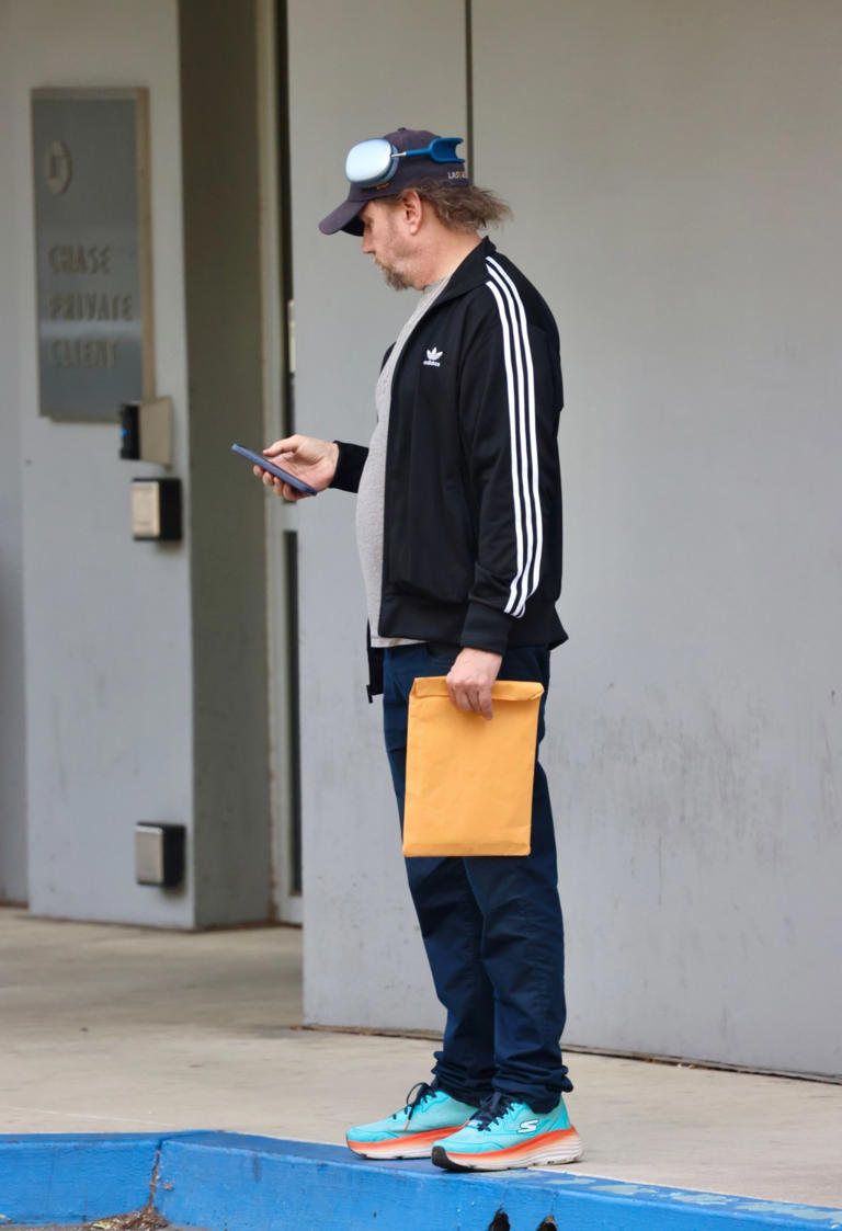 Nineties movie star looks unrecognizable zipping around LA on electric ...