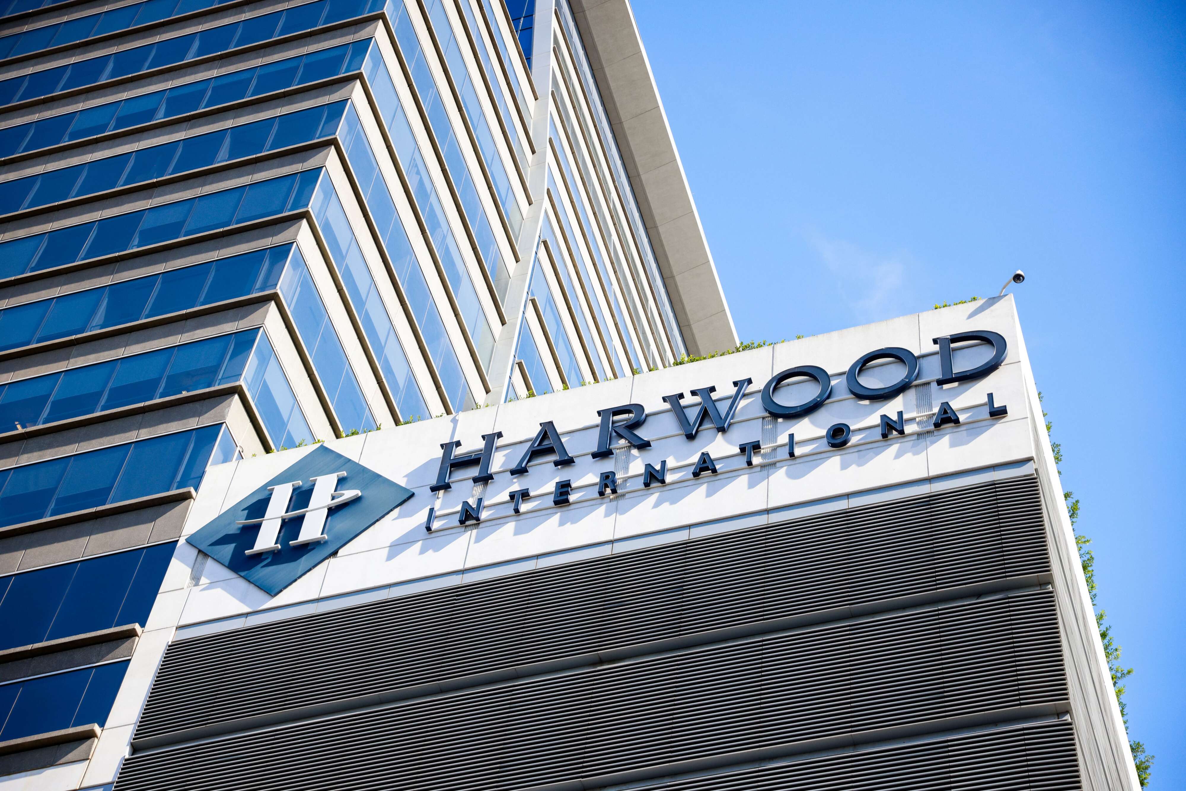 A world of trouble. Developer Harwood sells handful of towers, faces ...