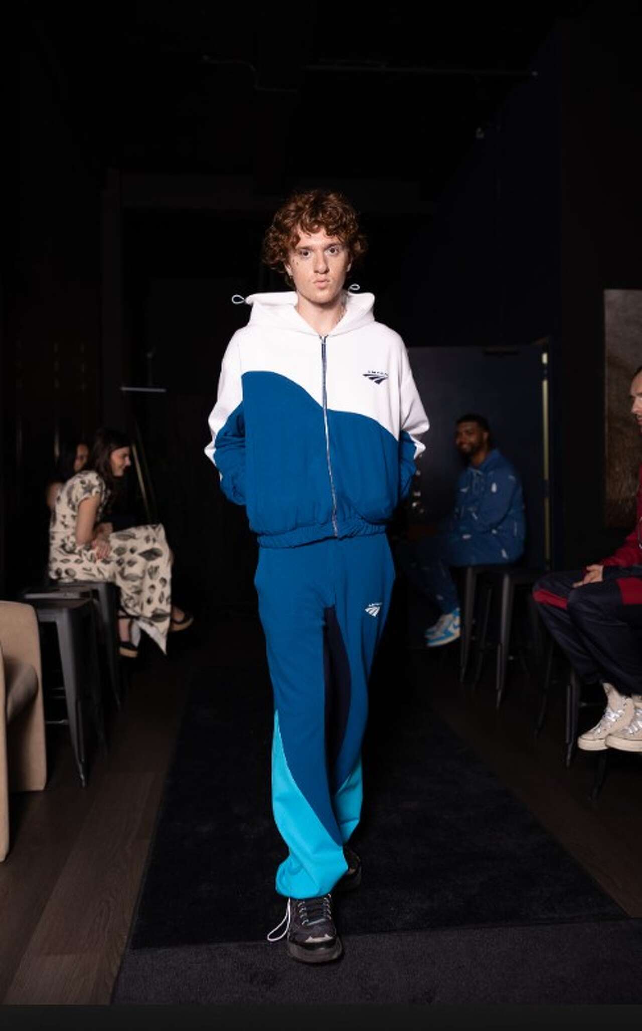 Ridin' the rails in style: Amtrak unveils its fashionable 'Trak Suit'