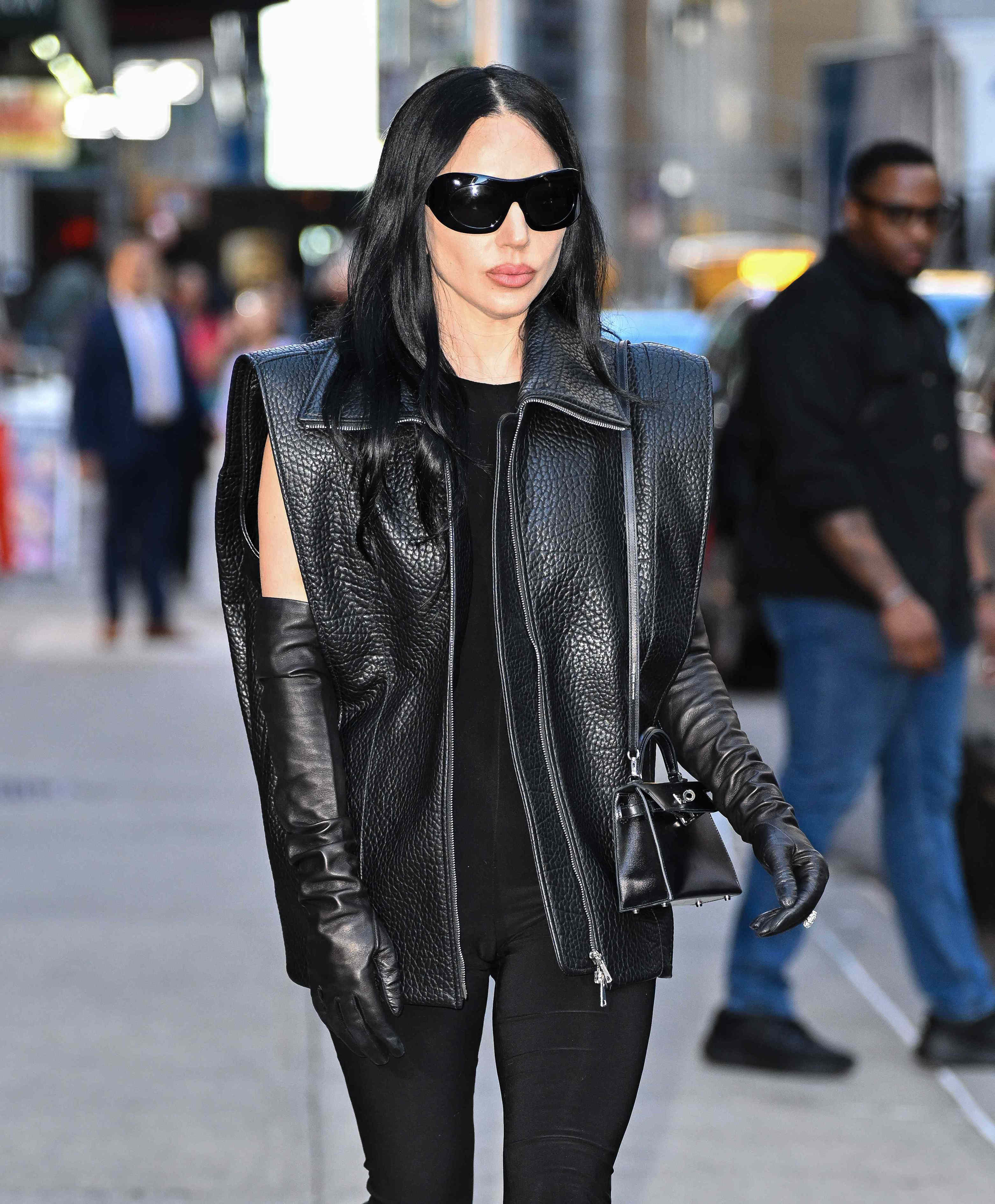 Lady Gaga switches up her hair again, trading her red blunt bob for ...