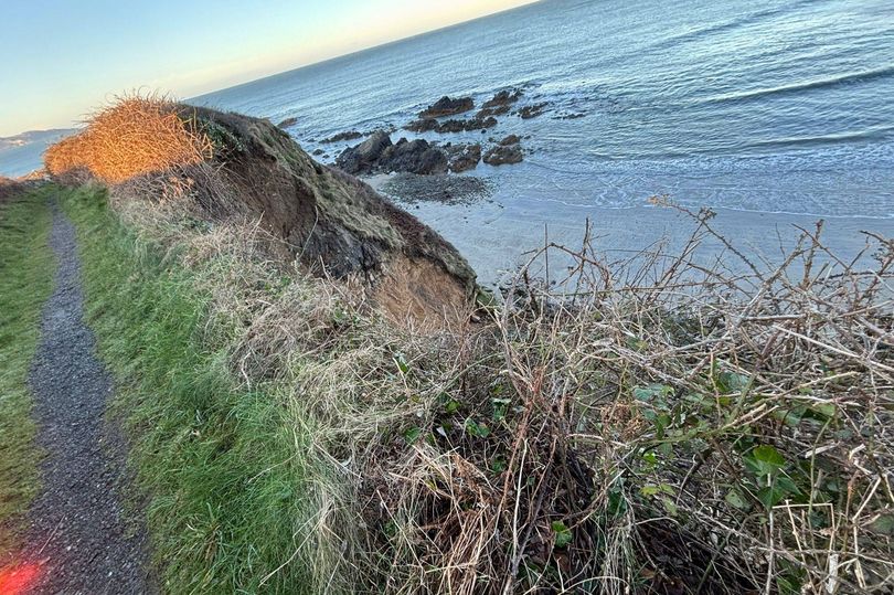 People told to 'avoid the area' after major cliff collapses at Anglesey ...