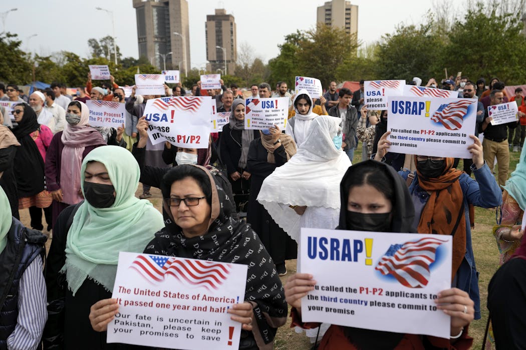 Afghan migrants stranded in Pakistan after the US suspends refugee ...