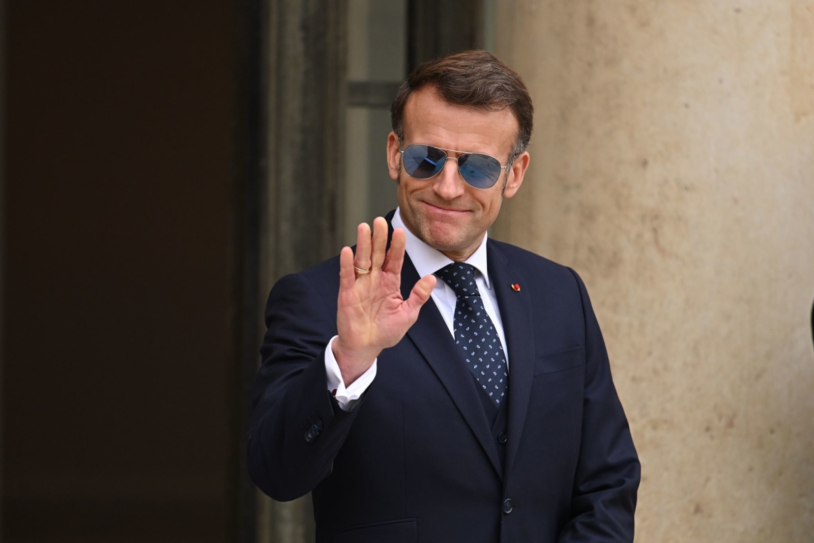 Macron ditches iconic sunglasses