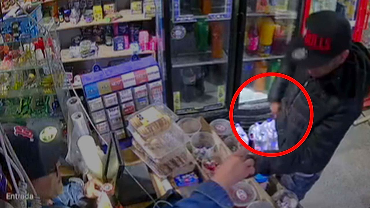 Store manager confronts armed robber in dramatic face-to-face standoff