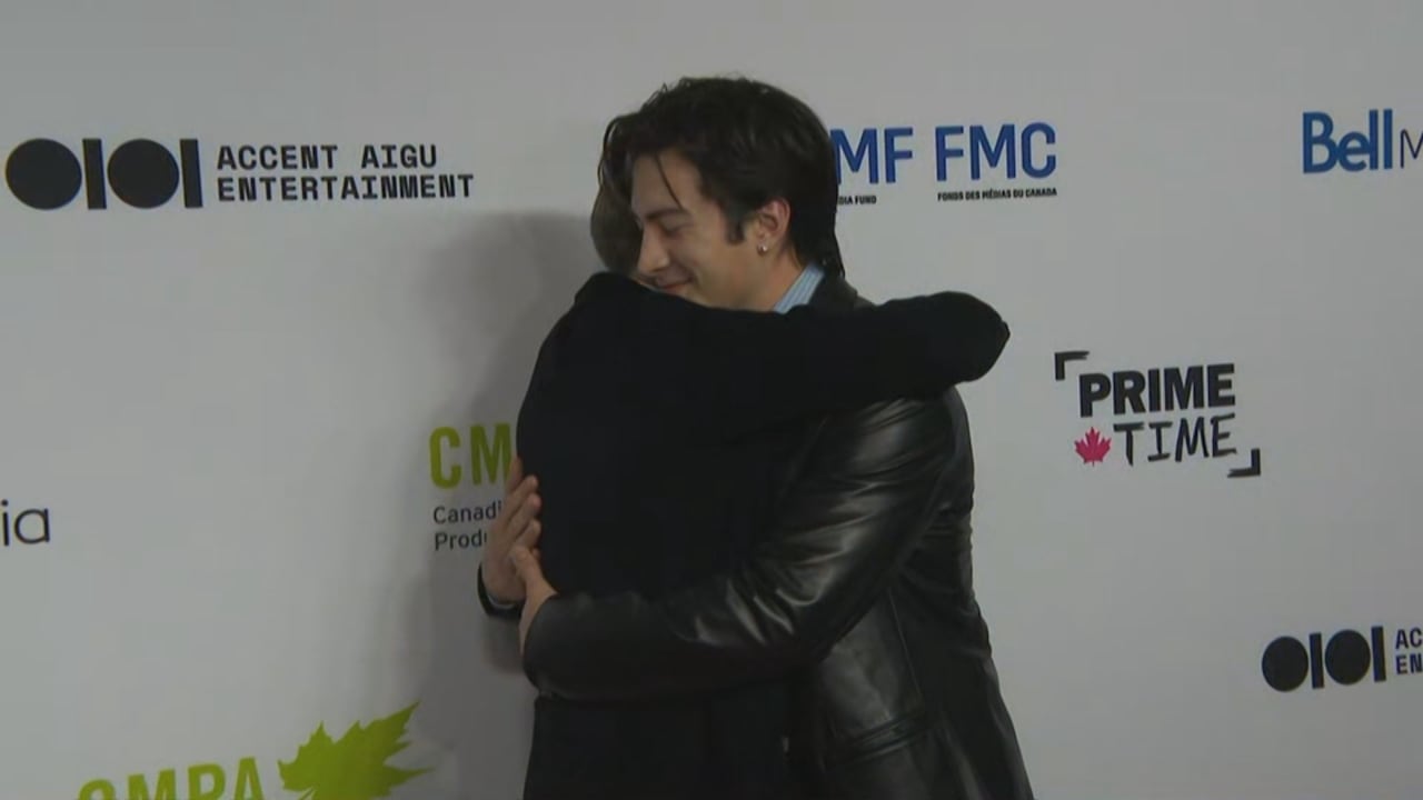 Mark Carney hugs Heated Rivalry star