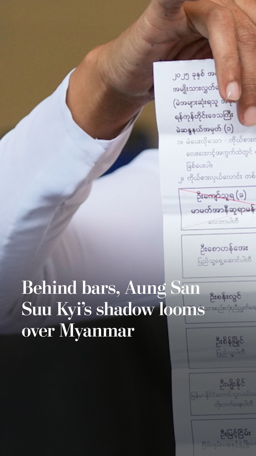 Behind bars, Aung San Suu Kyi’s shadow looms over Myanmar