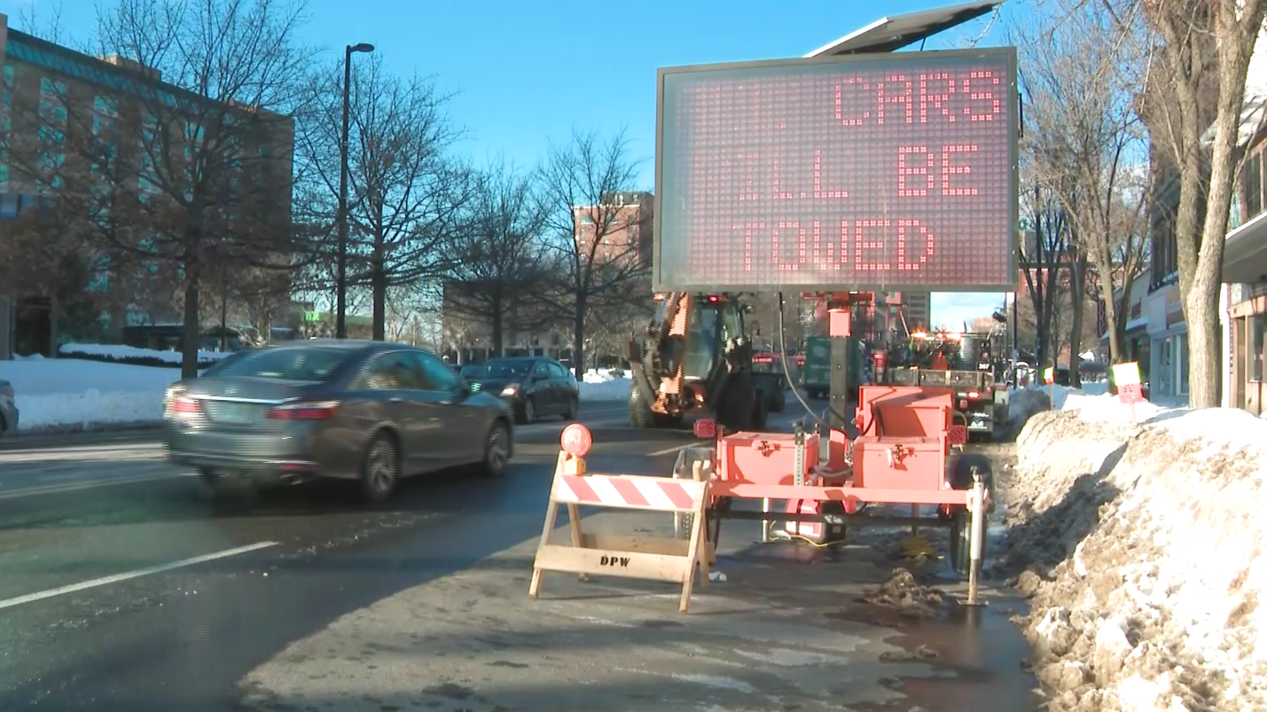 Manchester crews work to clear snow along Elm Street