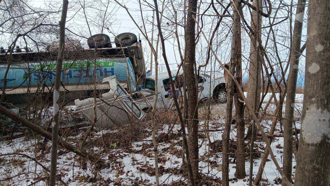 One person taken to hospital after tanker overturns on icy road in ...