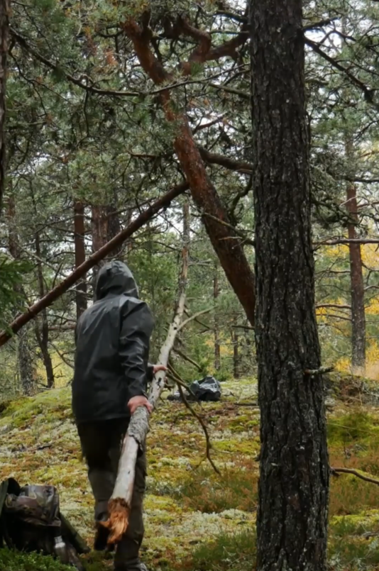 Tarp vs. rain: Testing a bushcraft shelter under a tree