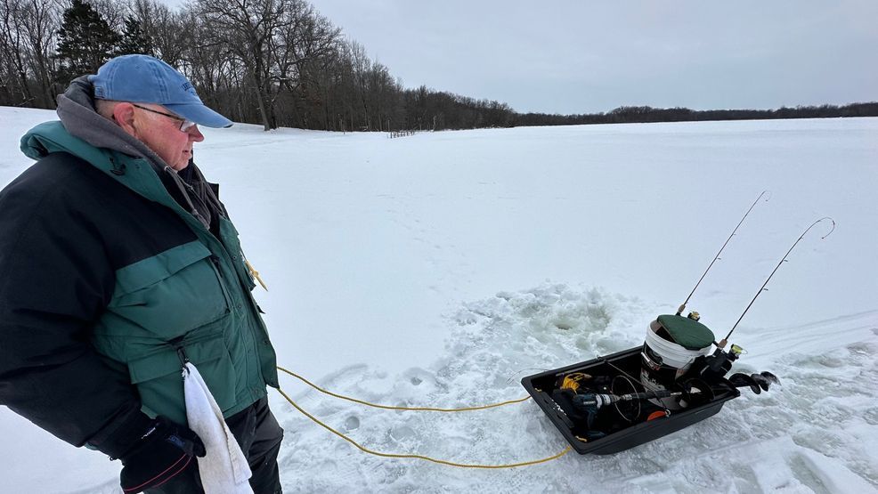 Ice fishermen brave frigid temperatures for biting fish in Kalamazoo County