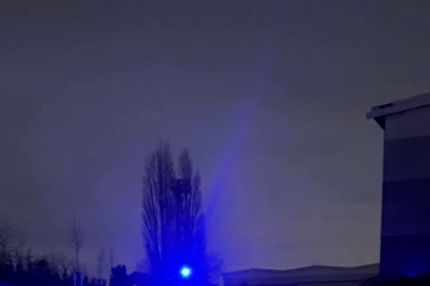 'Dystopian' security system shines blue lights into people's homes