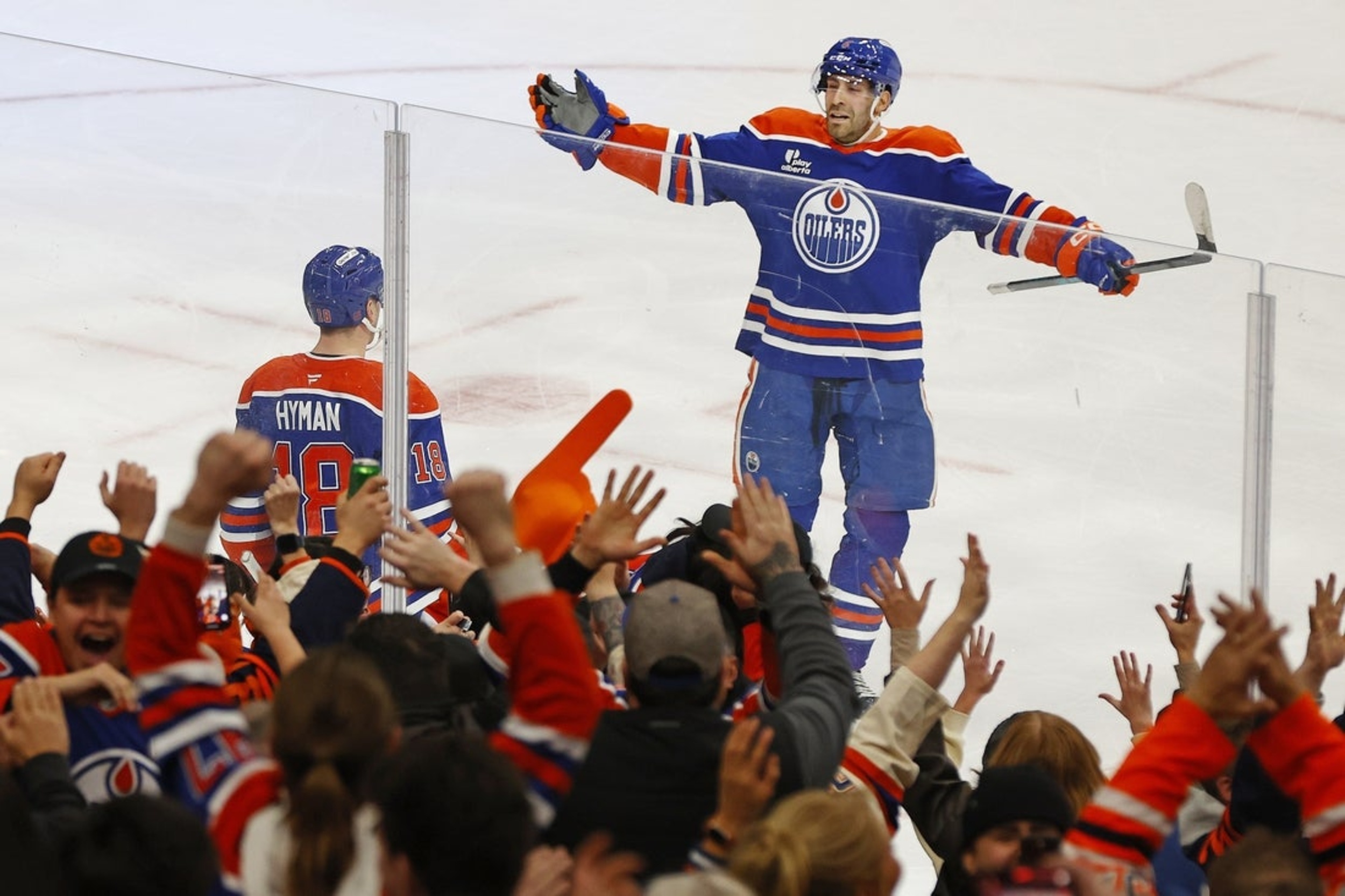 After scoring 3 in 3rd, Oilers cap rally with OT goal to stun Sharks