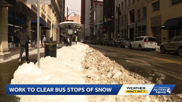 PRT clearing snow from bus stops after winter storm