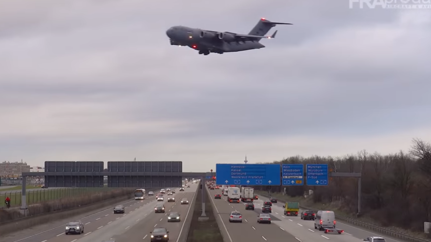 Watch a military aircraft thunder into Frankfurt in golden light