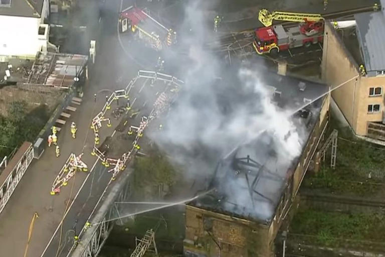 Euston train station chaos as fire near major railway line causes huge ...