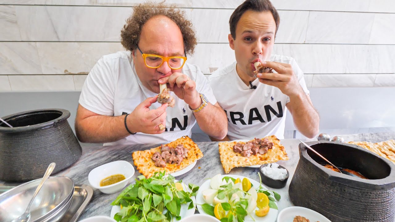 Iranian sosis bandari street sandwich with spicy tomato and onion sauce
