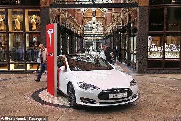 Is Tesla turning its back on electric cars? Musk's firm stops producing ...