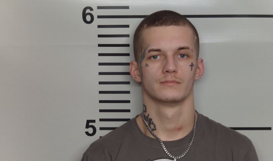Louisville man arrested after allegedly hitting LMPD officer with bulldozer