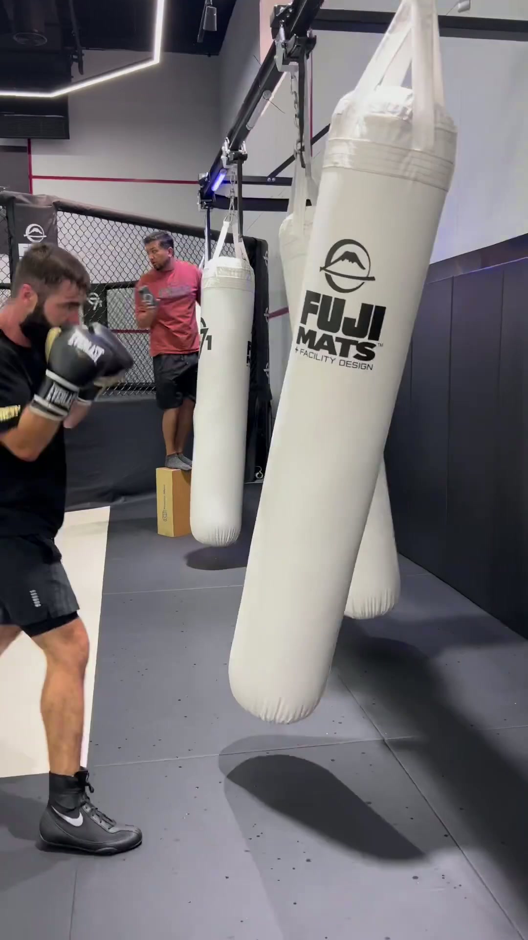 Jono Carroll unloads a full barrage of punches on the heavy bag workout