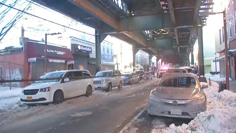 Cold appears to cause cable to fall from elevated subway tracks onto ...