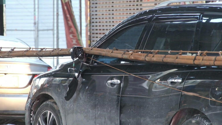 Cables fall from Brooklyn elevated subway tracks onto cars below