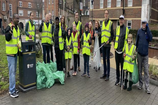 Church brings community together to clean up its green space