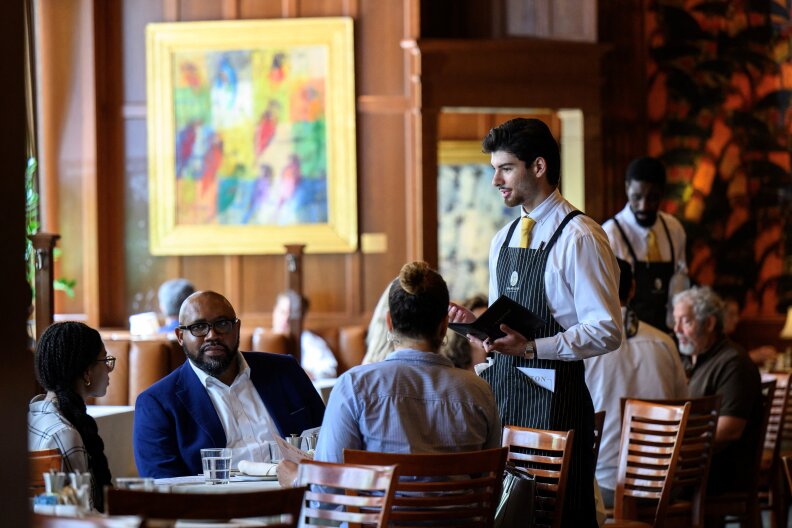 Who should pick up the check when going out to eat?