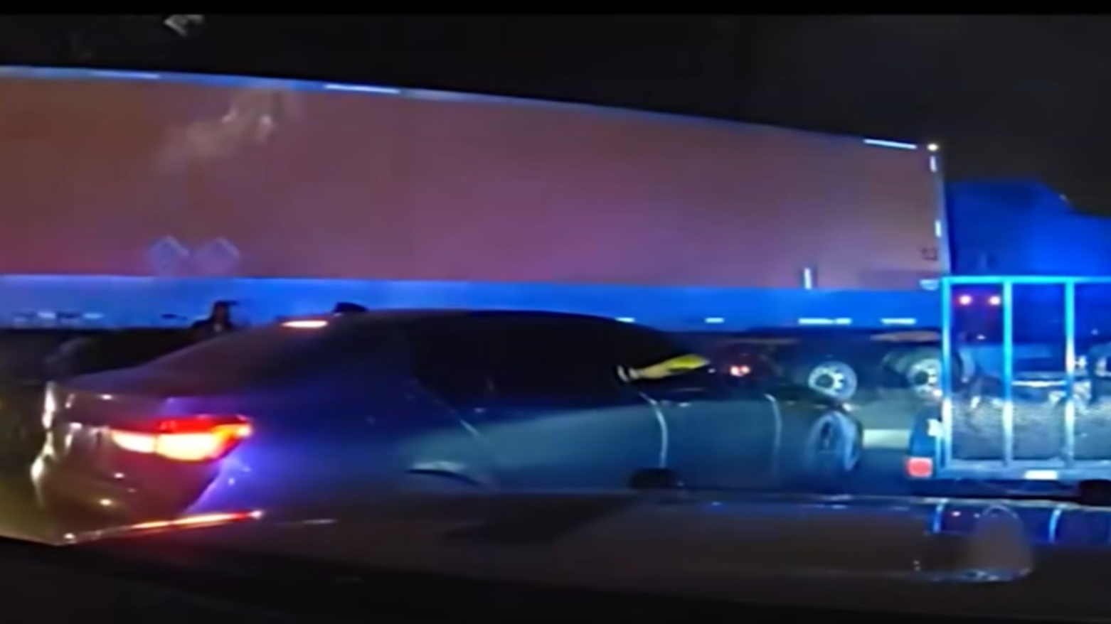 Police stop turns into horror when semi nearly hits officers on camera