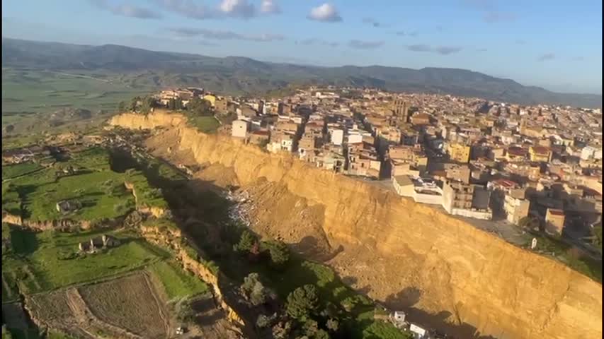 Houses on the brink, shattered roads and that new rock face: flying ...