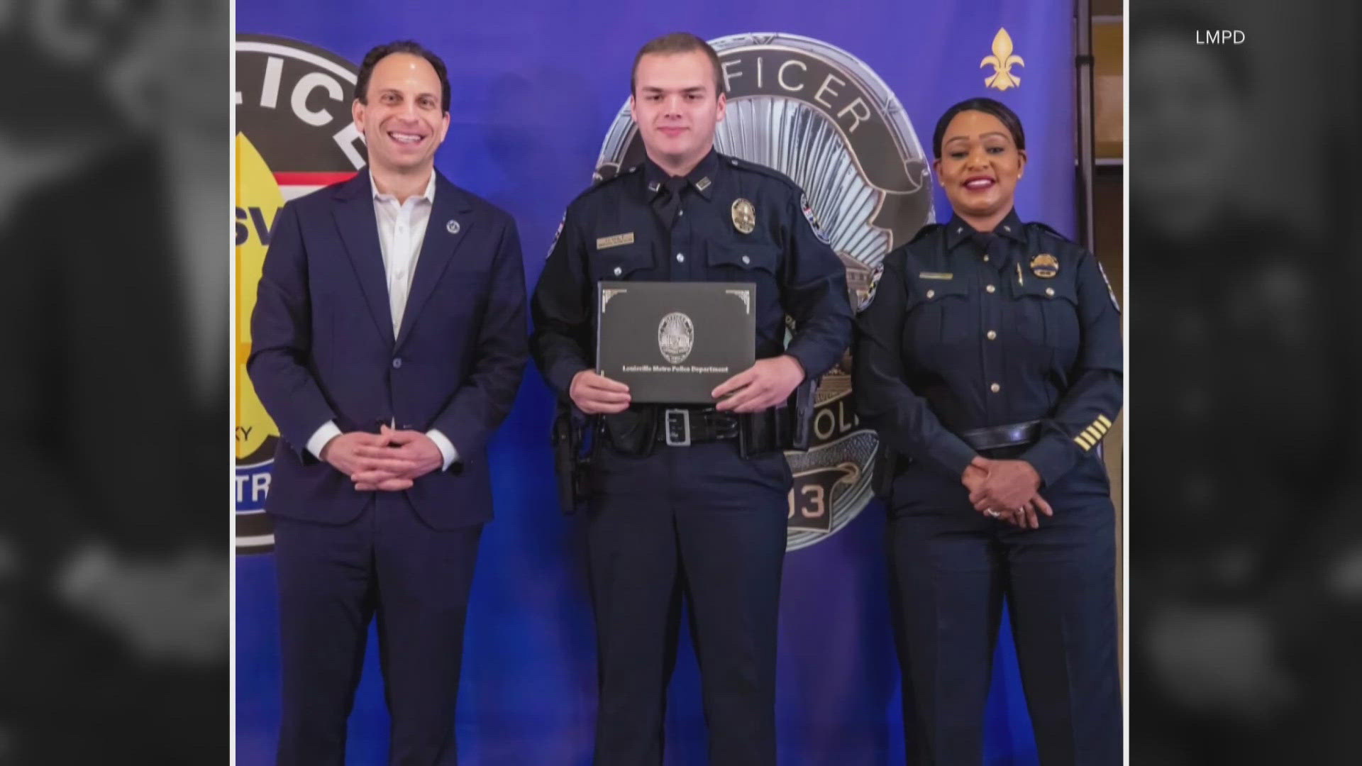 LMPD officer shot during bank shooting retires, honored with key to city