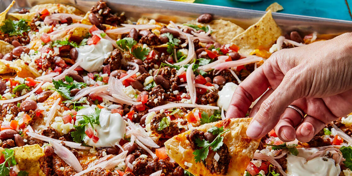 Sliding sheet pan nachos are the ultimate Super Bowl trend on TikTok