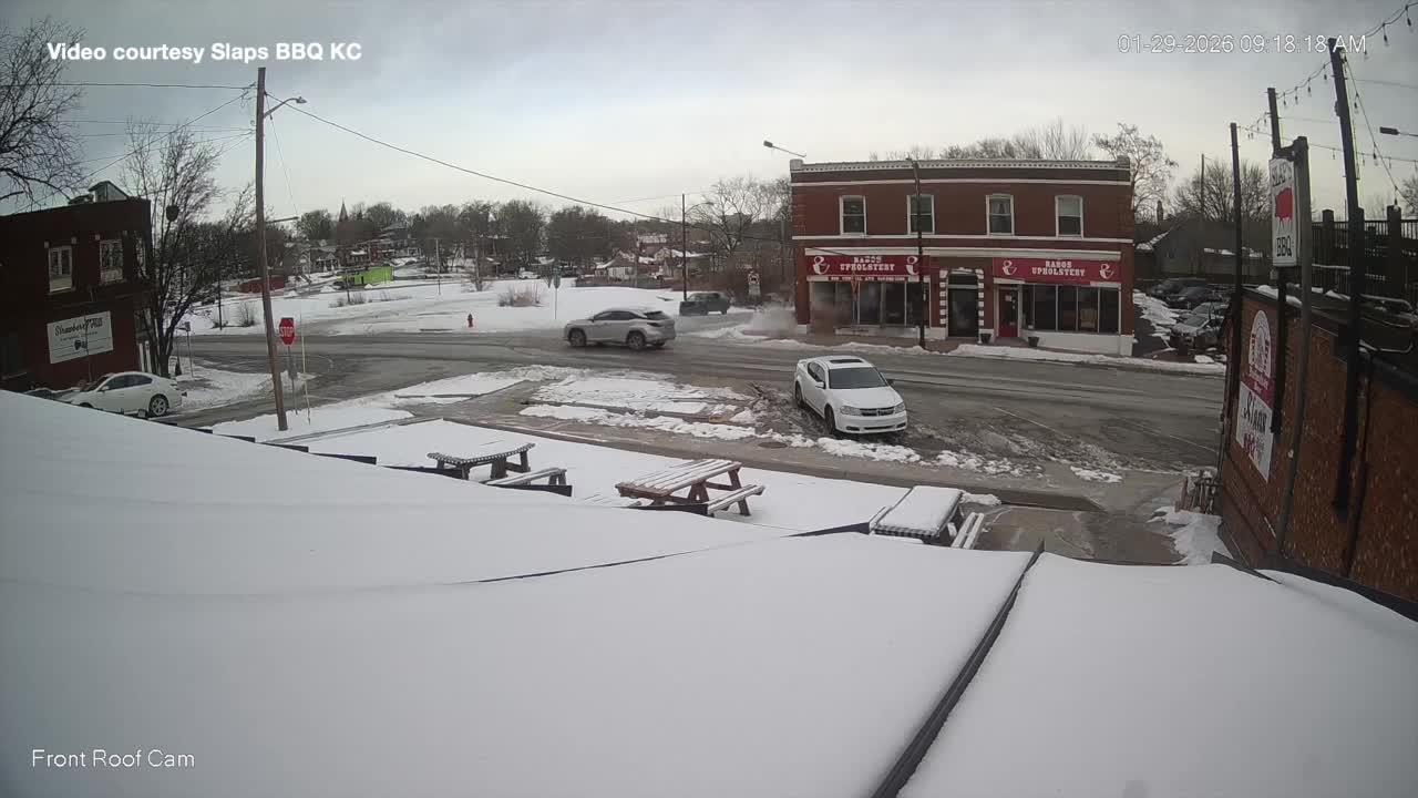 Surveillance video shows SUV crash through building at high speed