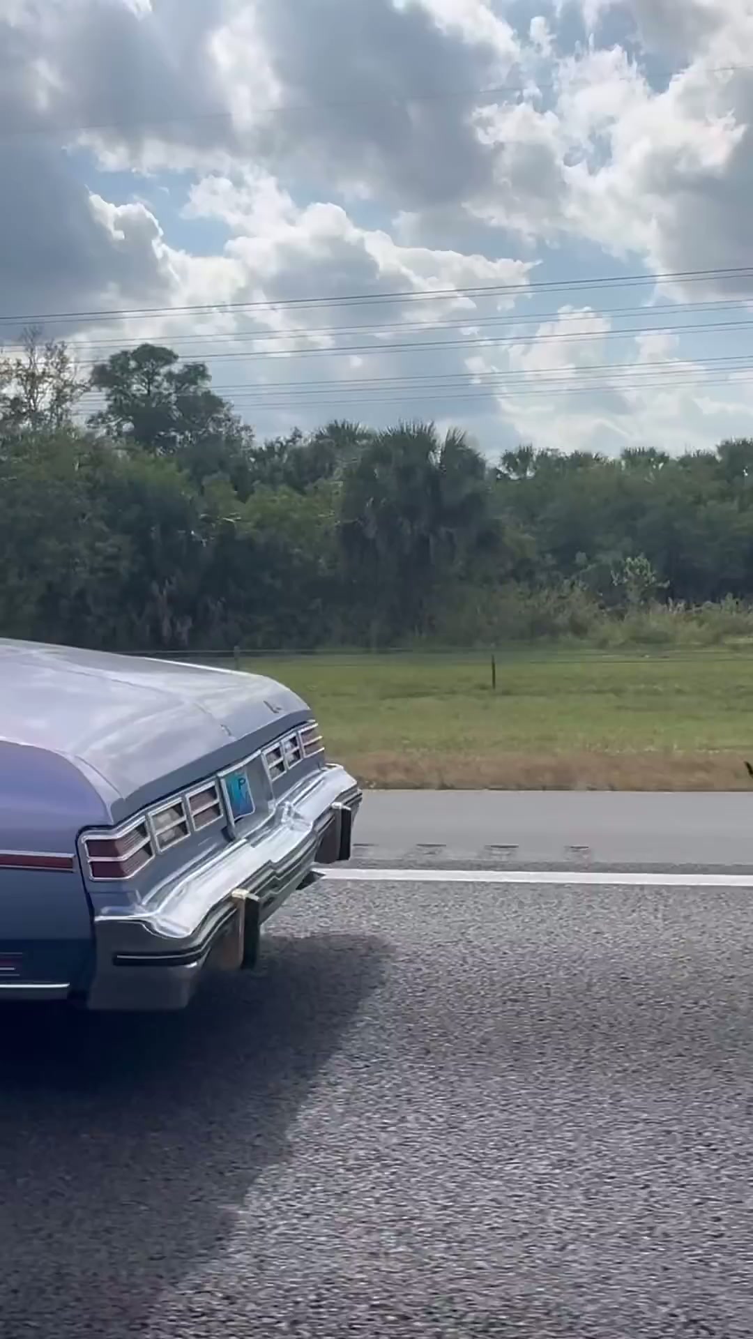 Stunna-Reese driving his 75 Chevy vert on 26’s from Orlando to Miami
