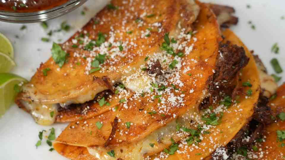 How to make juicy beef birria tacos with crispy dipped tortillas