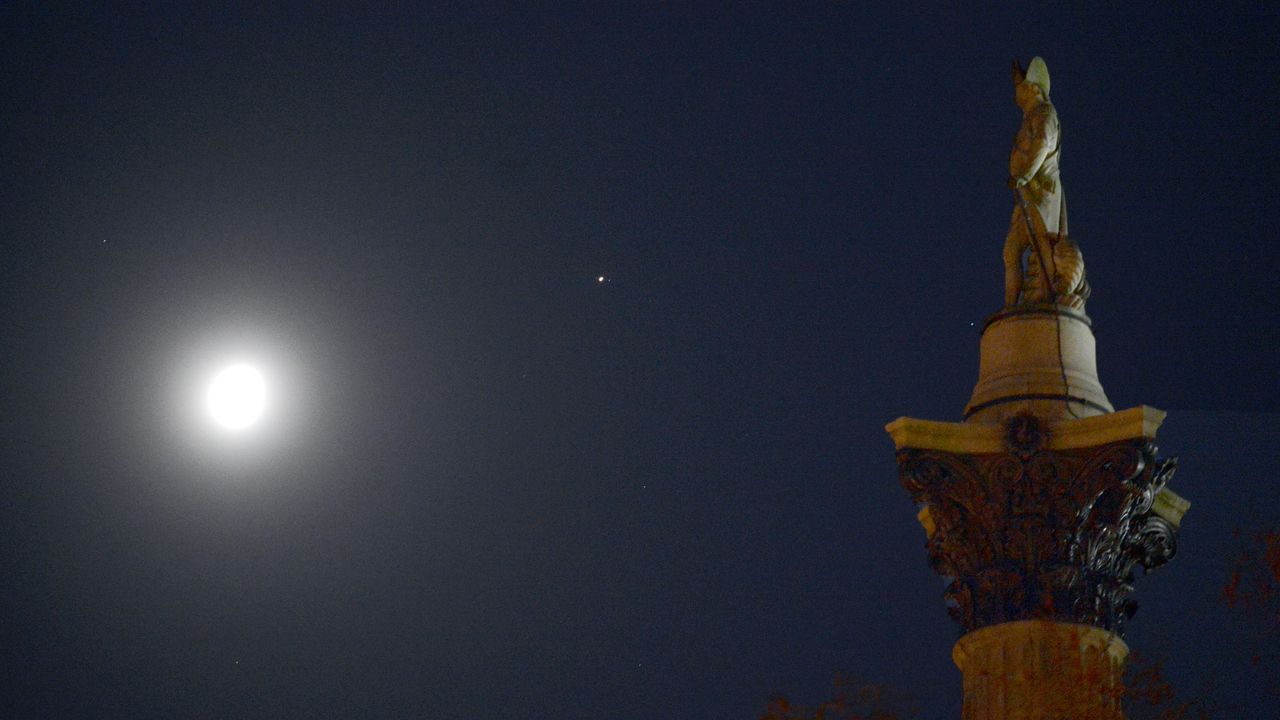 See the moon glow next to mighty Jupiter in the winter sky tonight
