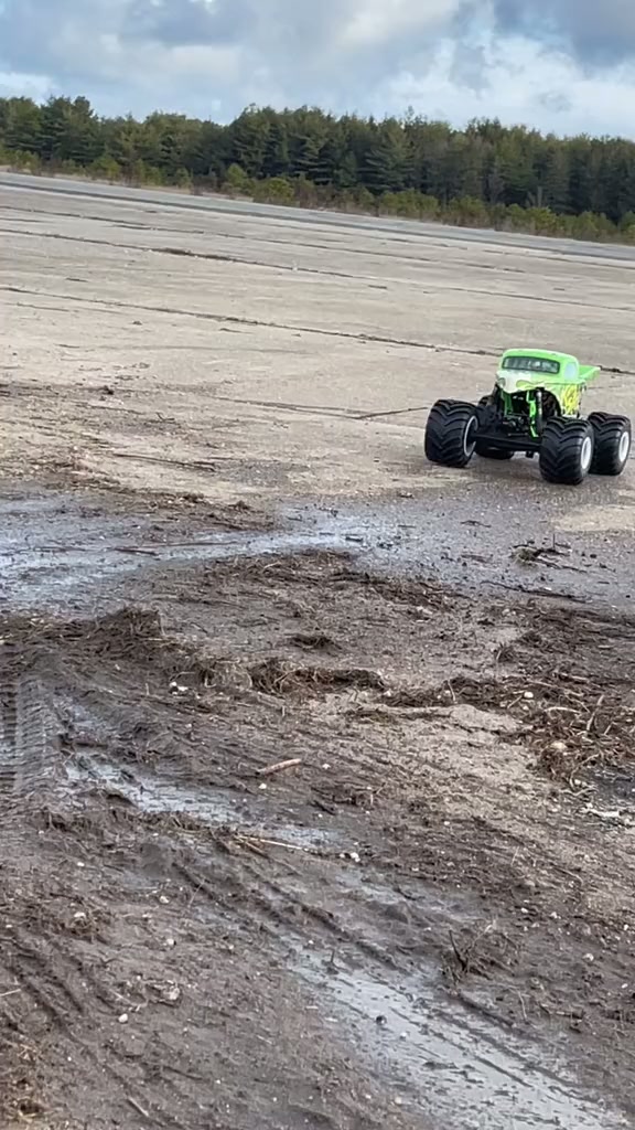 Breaking in my new RC monster truck in muddy mayhem